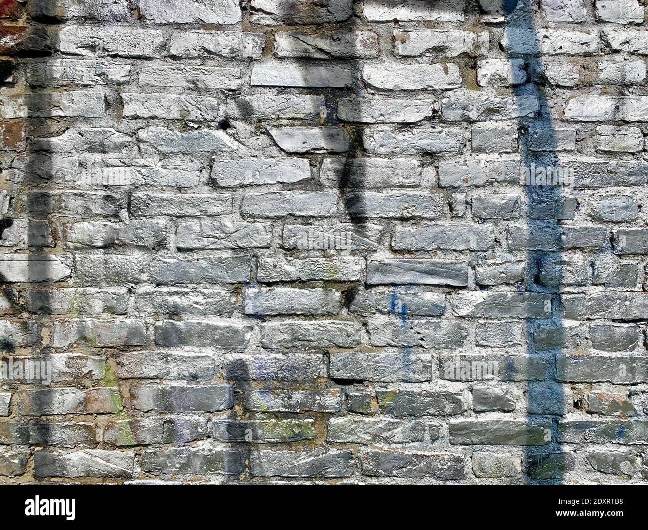 A stone wall texture painted with silver paint Stock Photo - Alamy