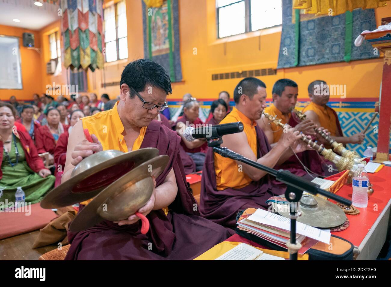 Nepalese Buddhist monks play traditional instruments during a prayer ...