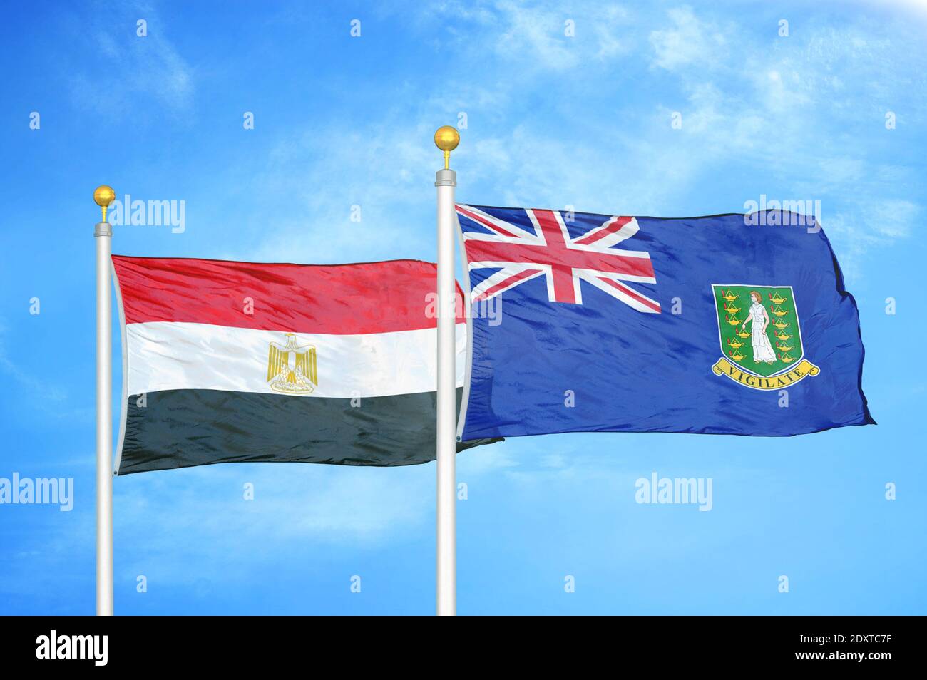 Egypt and Virgin Islands British two flags on flagpoles and blue cloudy ...