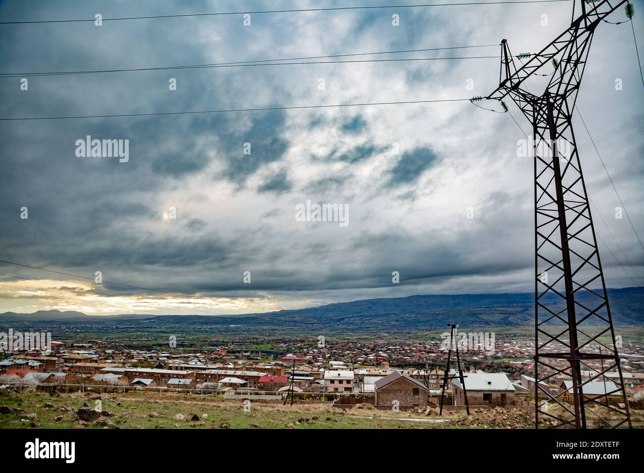 Long shot of Ashtarak town, Armenia in spring with dramatic colours ...
