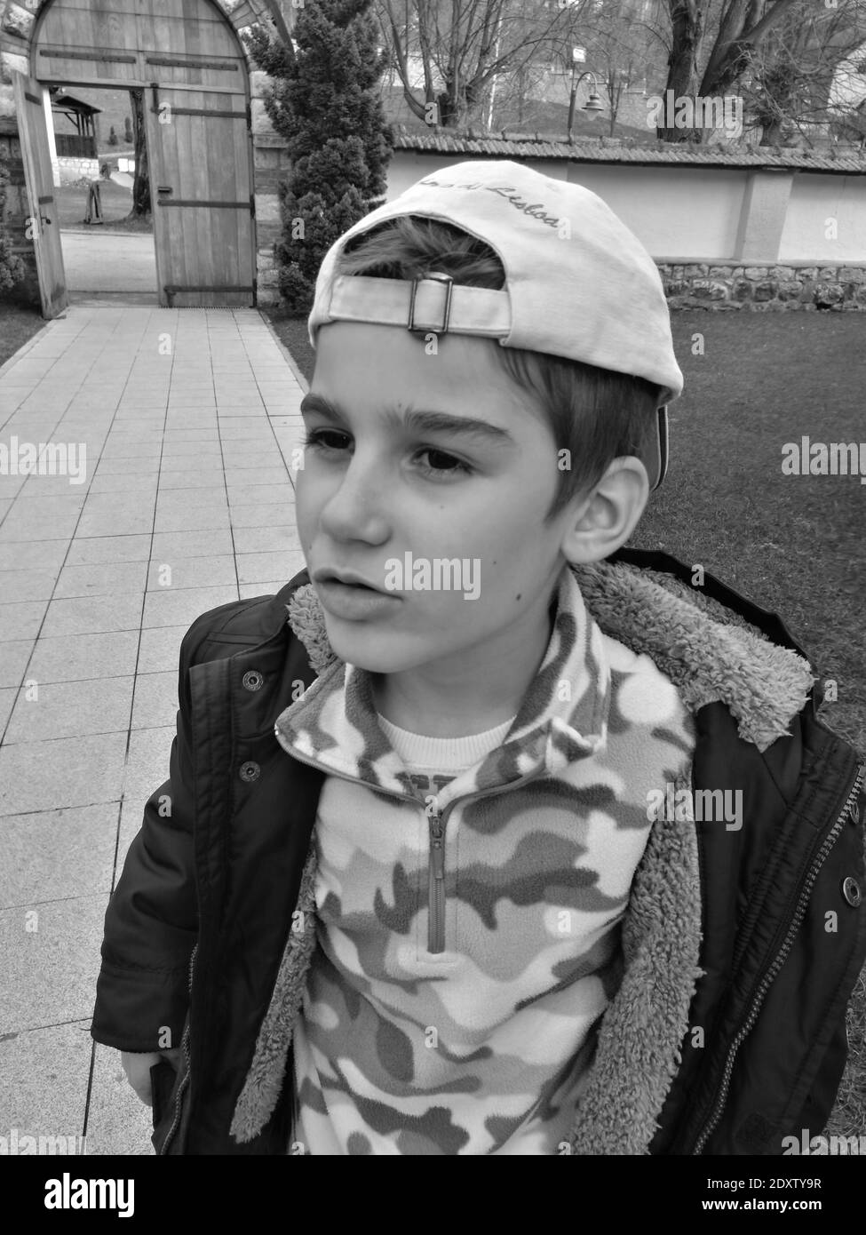 Boy wearing cap Black and White Stock Photos & Images - Alamy