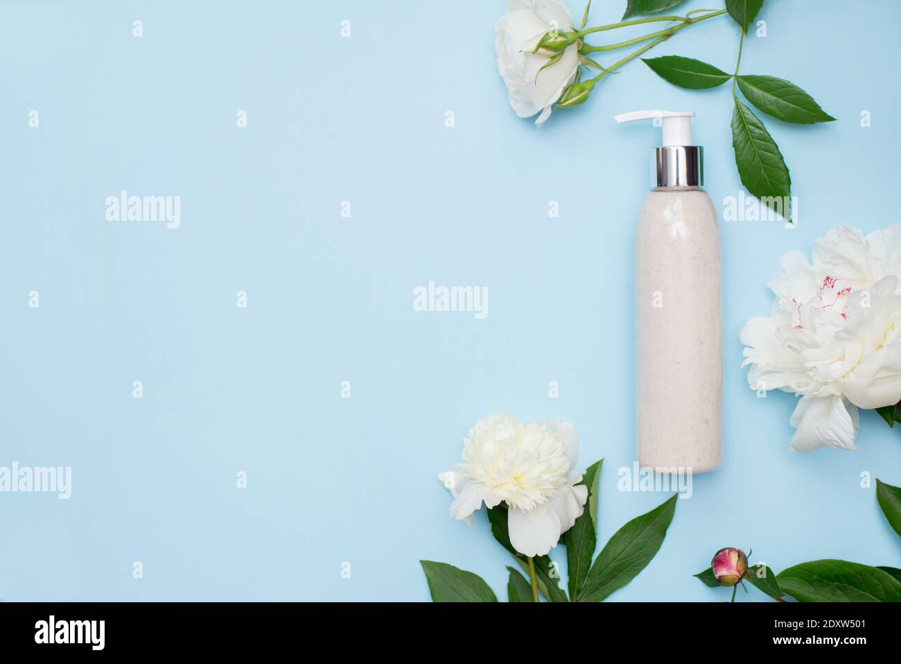 Body or face natural care lotion or bath milk decorated with white ...