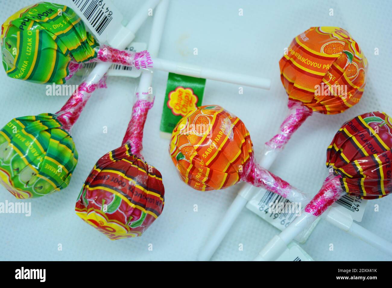 A handful of bright, colorful, popular sucking candies, round candies ...