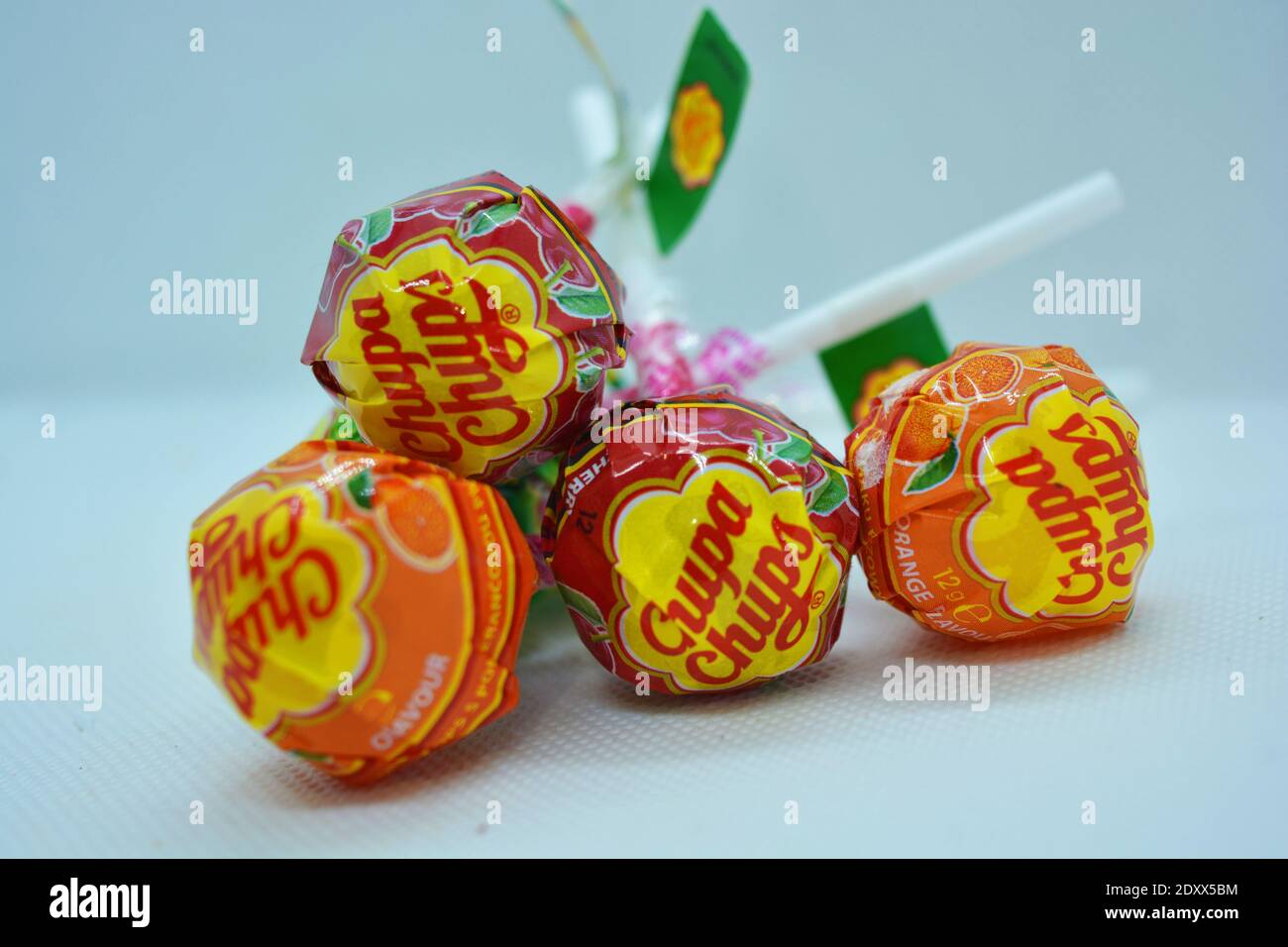 A handful of bright, colorful, popular sucking candies, round candies ...