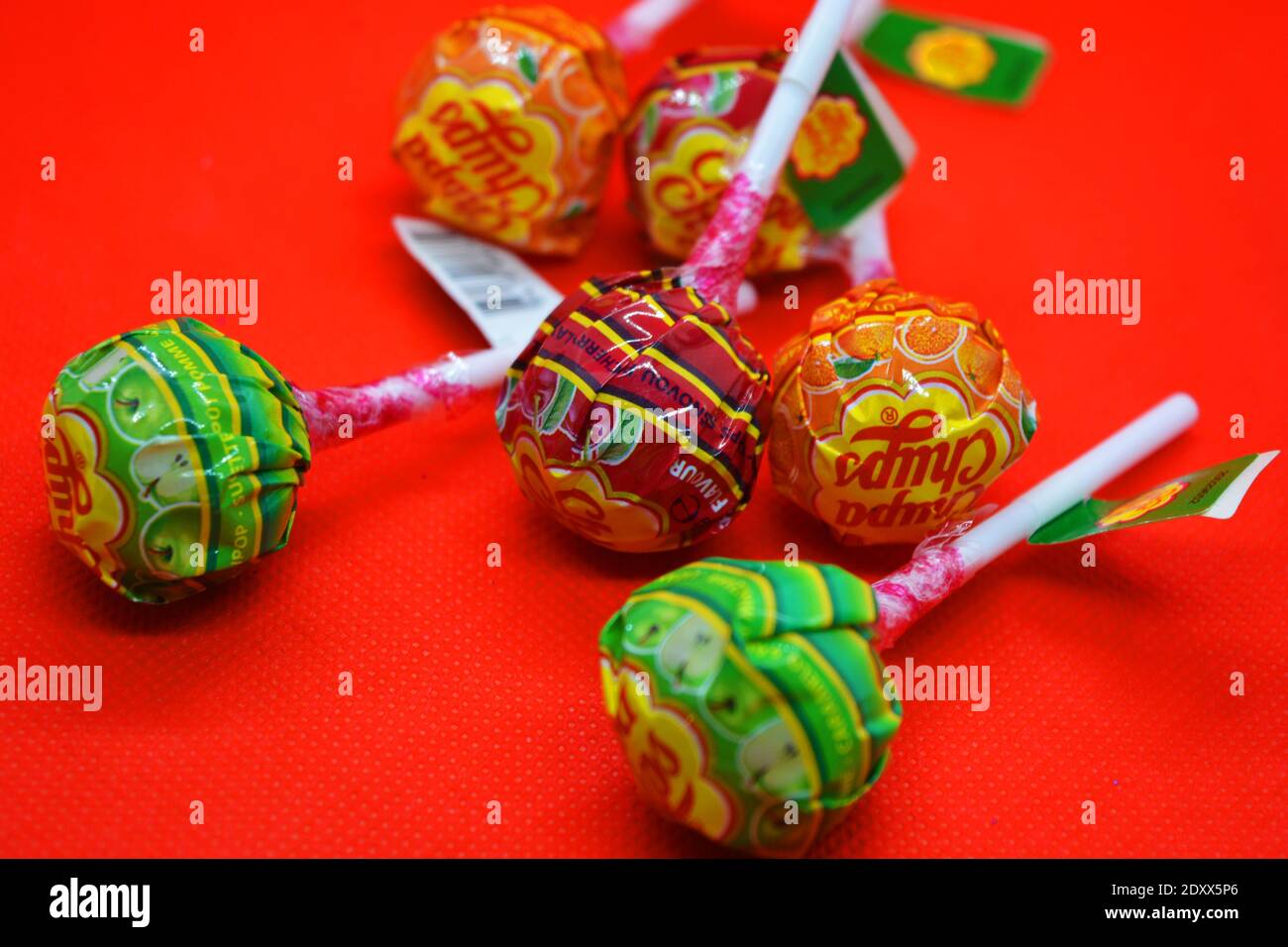 A handful of bright, colorful, popular sucking candy, round candies ...