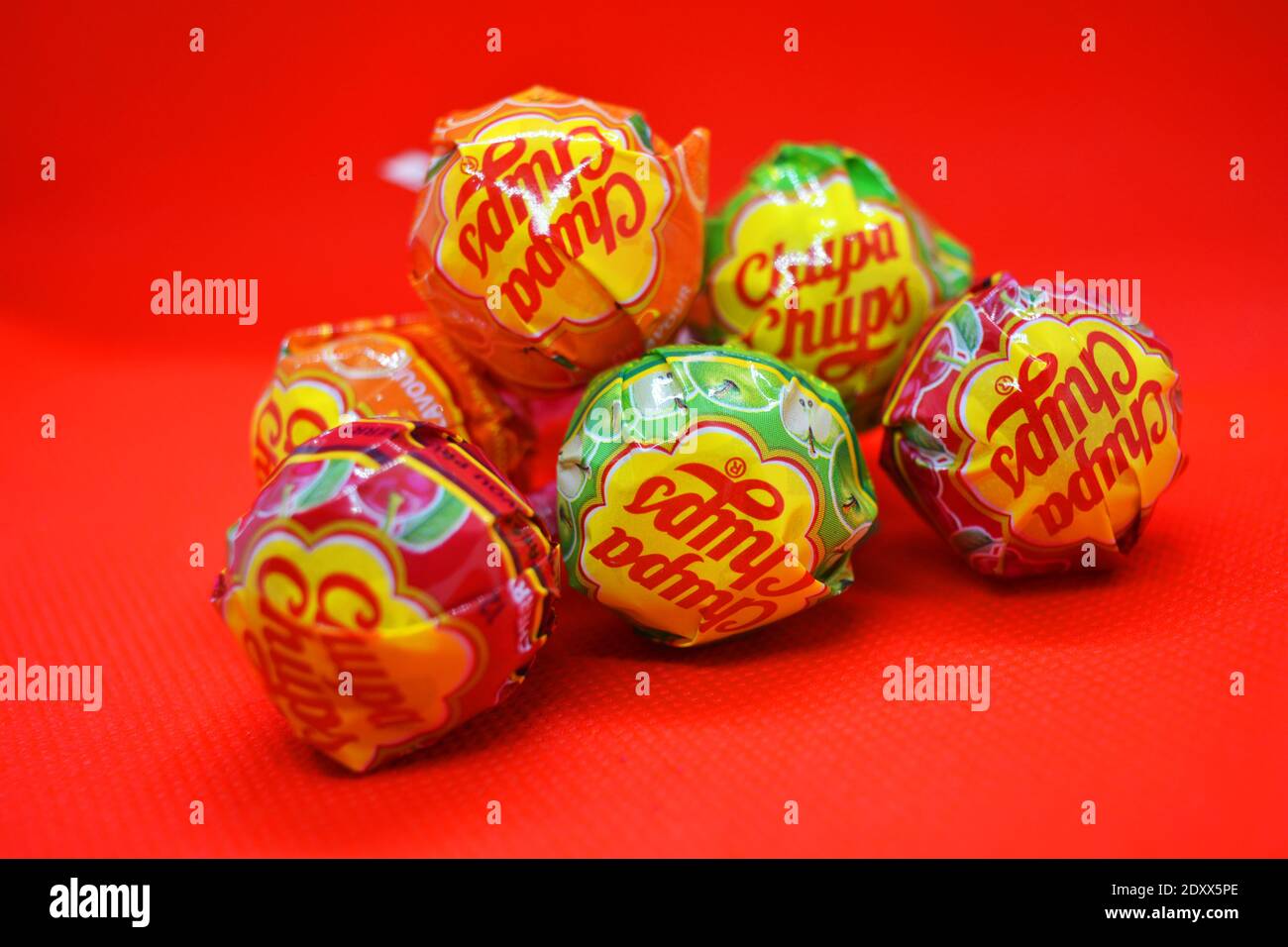 A handful of bright, colorful, popular sucking candy, round candies ...