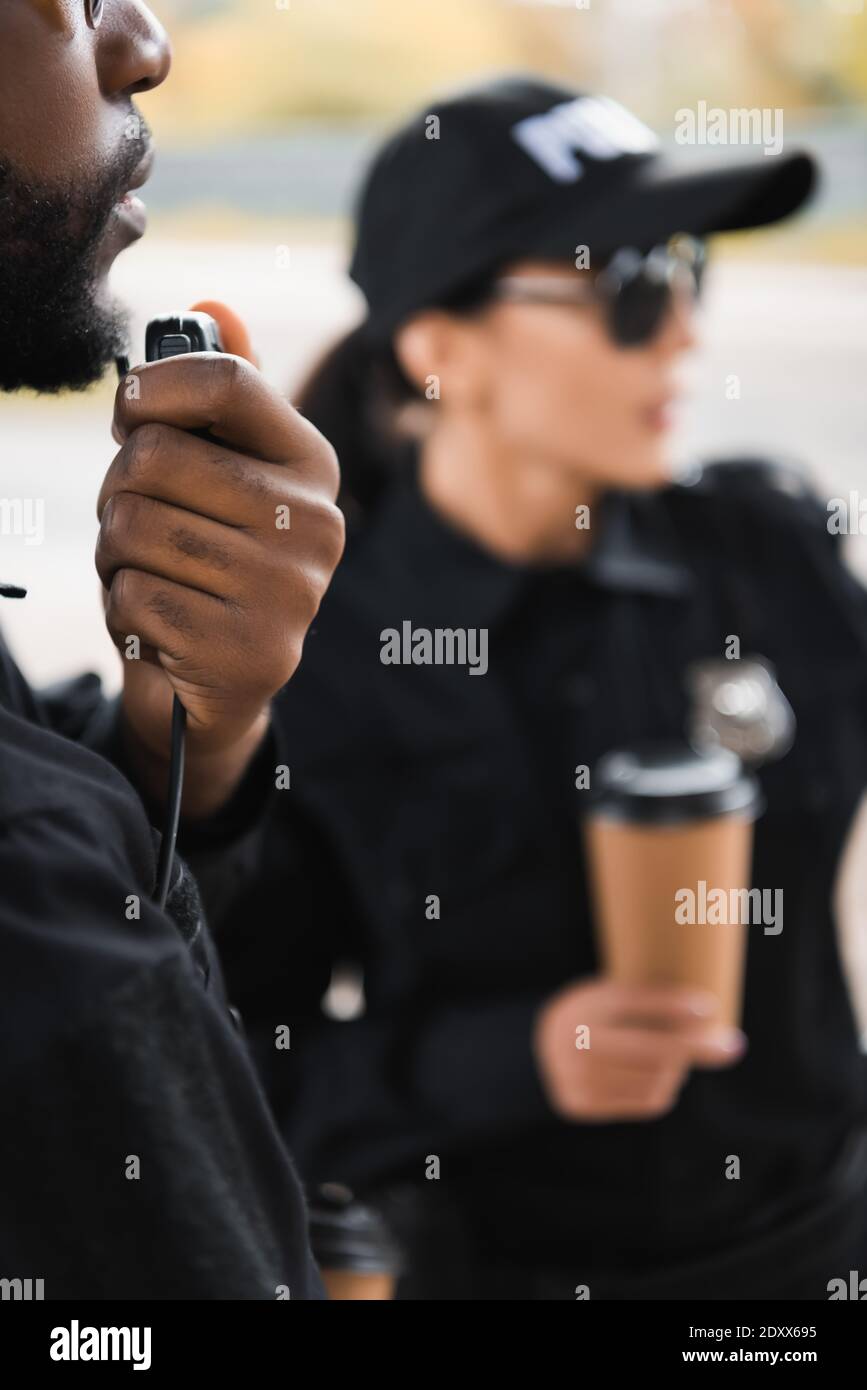 Police woman on radio hi-res stock photography and images - Alamy