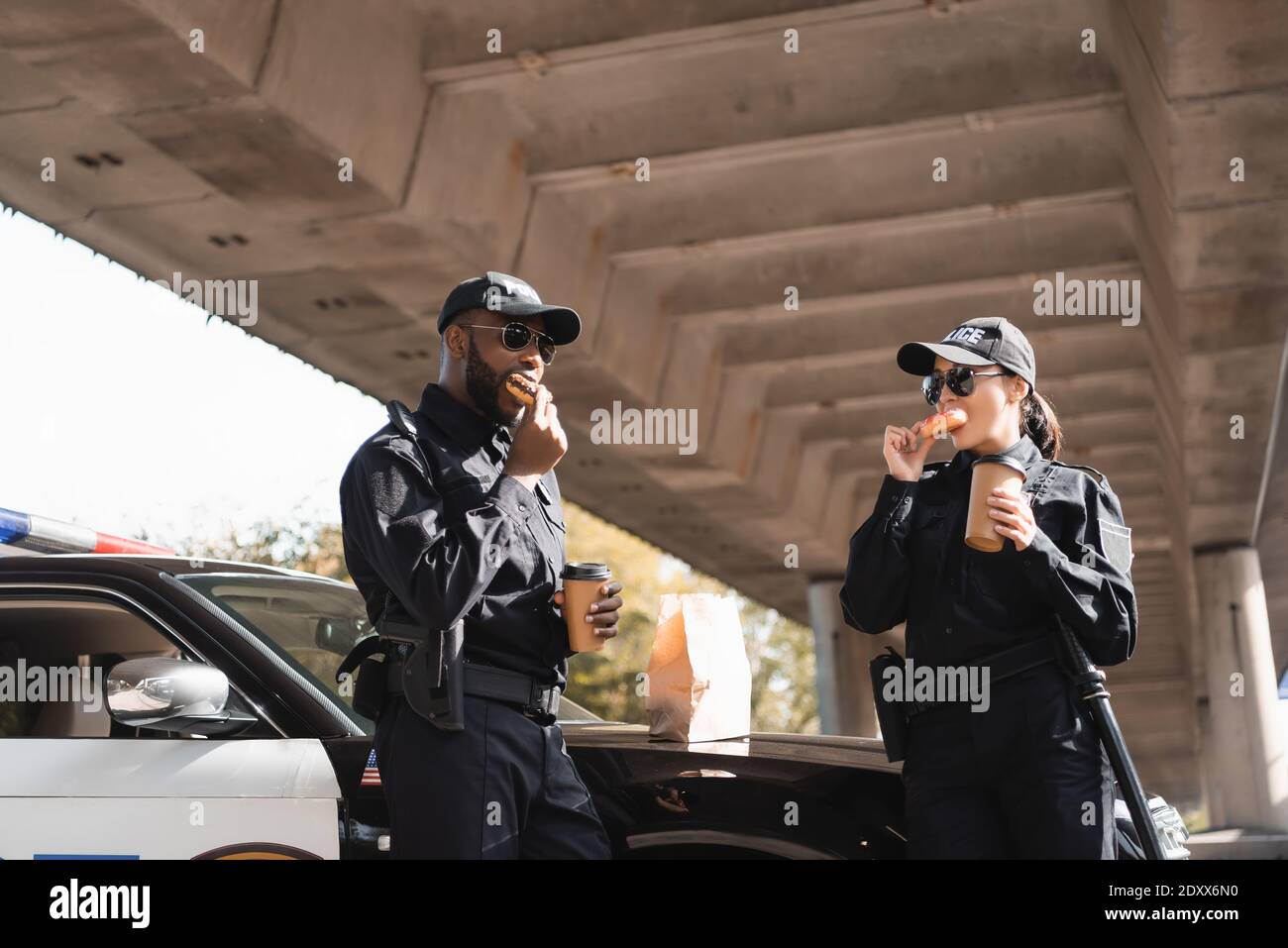 Police car doughnuts hi-res stock photography and images - Alamy