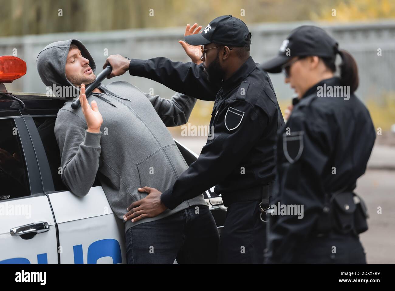 Police frisking hi-res stock photography and images - Alamy
