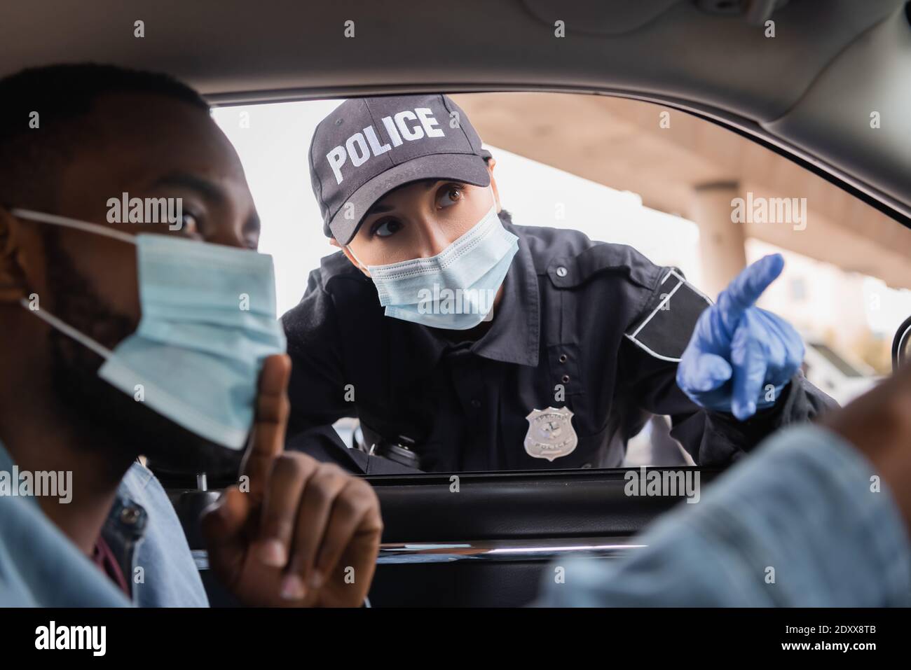 Police officer pointing finger hi-res stock photography and images - Alamy