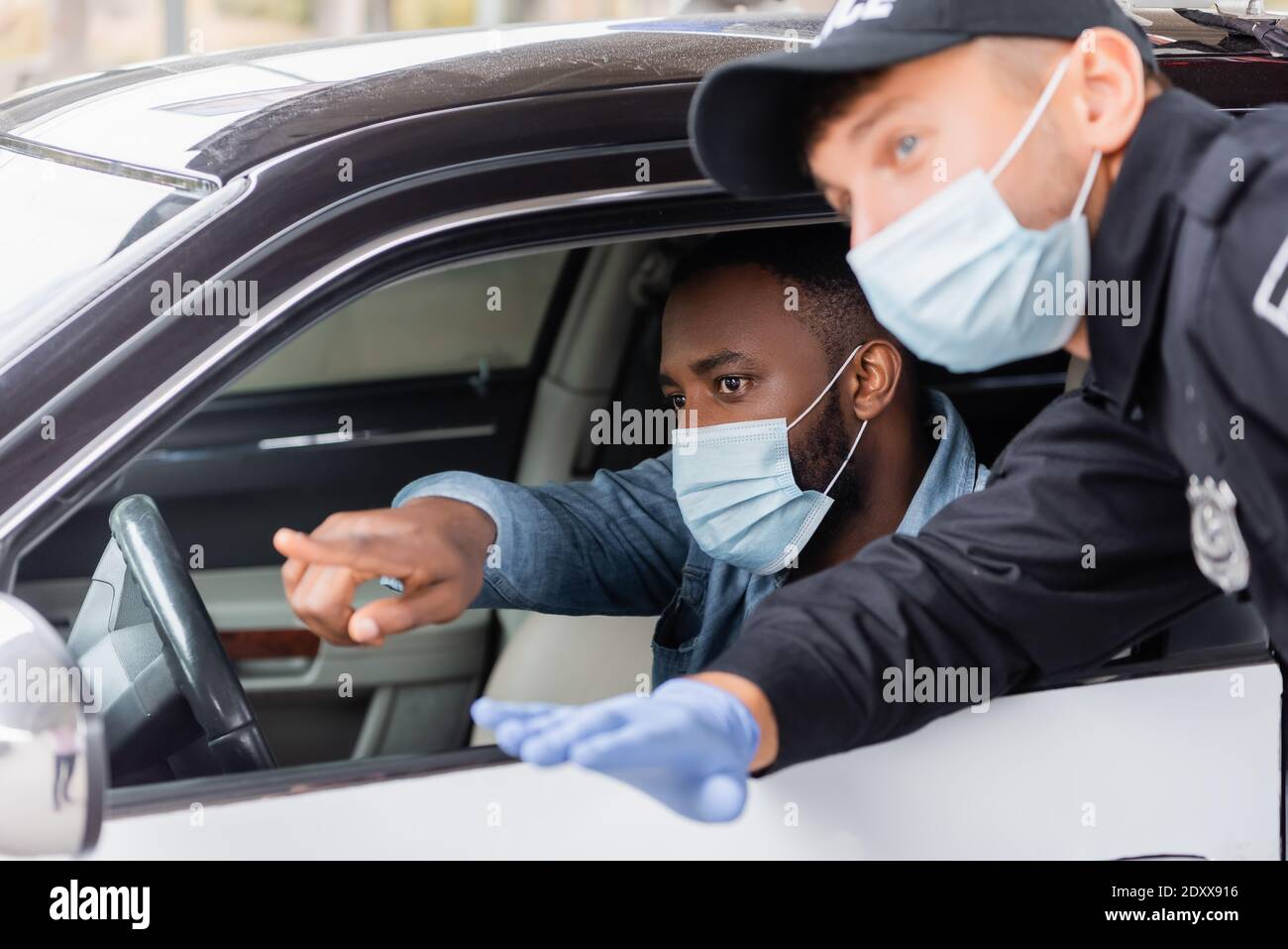 Police officer pointing finger hi-res stock photography and images - Alamy
