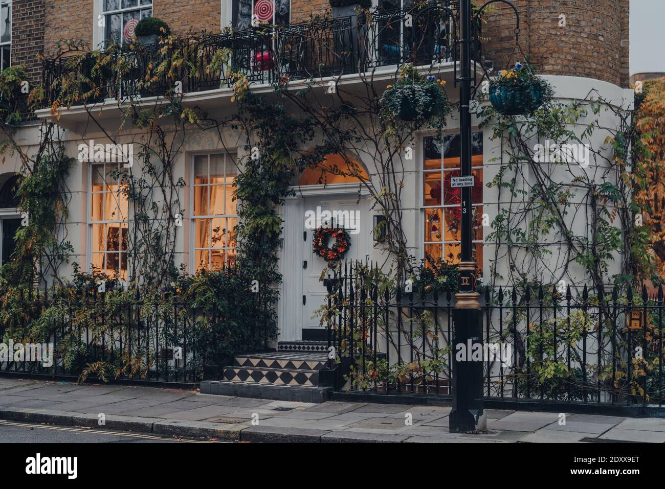 London, UK - December 5, 2020: Christmas wreath on the door of greenery ...