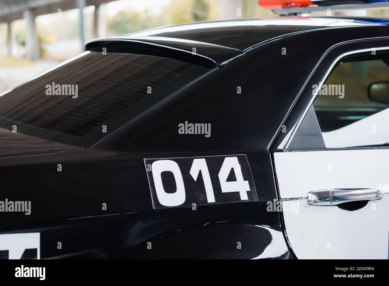 Patrol car with number on blurred background outdoors Stock Photo - Alamy