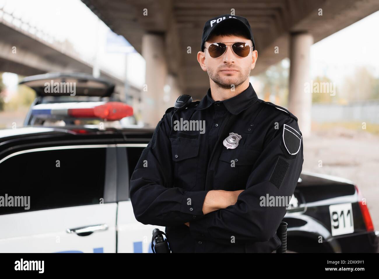 Police arms crossed hi-res stock photography and images - Alamy