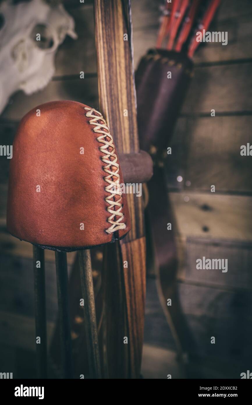 A traditional archery hunting scene with bow, quiver of arrows, and ...