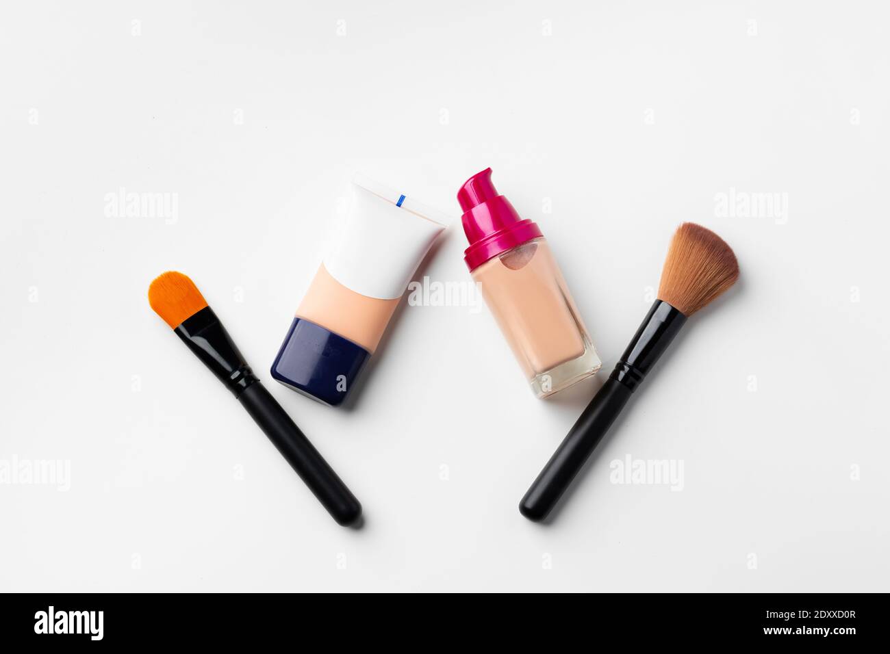 Make up liquid foundation with brush on white background Stock Photo ...