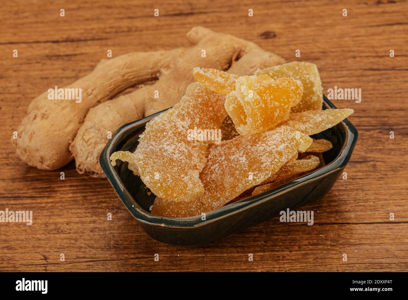Dry sweet ginger snack in the bowl Stock Photo - Alamy