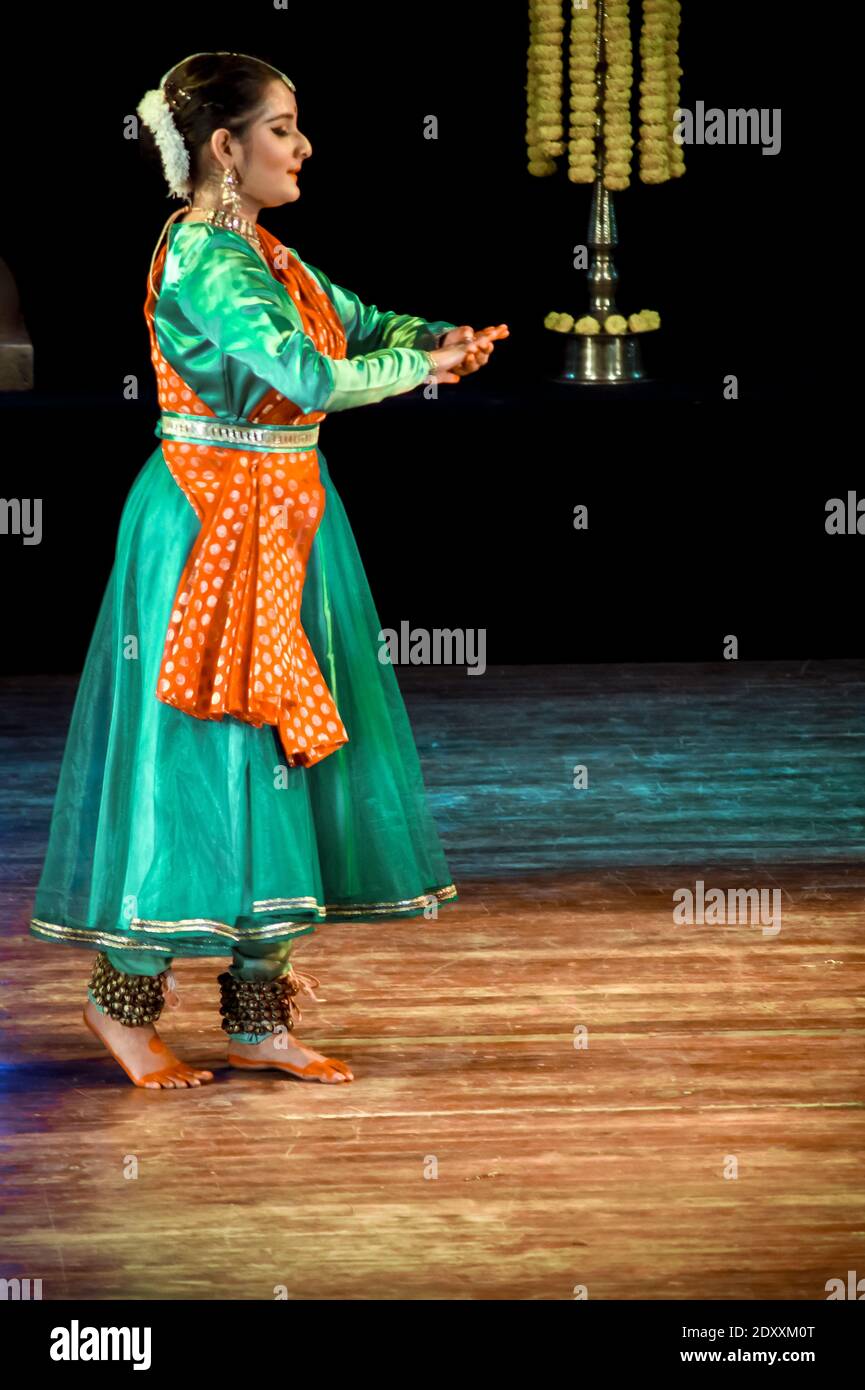 Smiling Woman In Traditional Clothing Dancing On Stage Stock Photo - Alamy