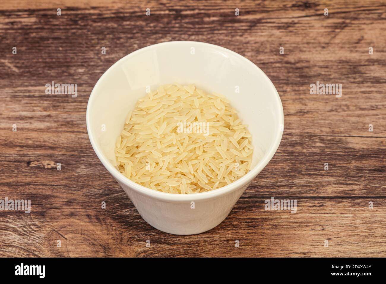 Raw Indian basmati rice in the bowl Stock Photo - Alamy