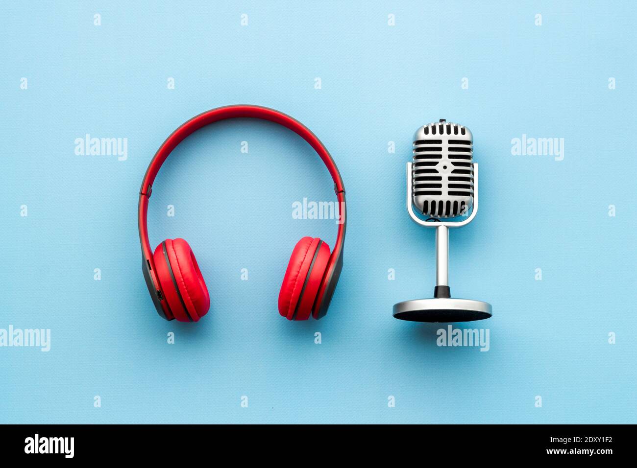 Studio microphone and headphones, top view. Recording podcast and ...