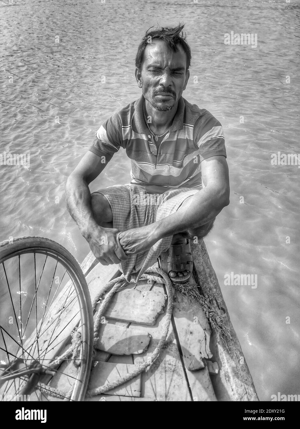 Indian man on boat Black and White Stock Photos & Images - Alamy