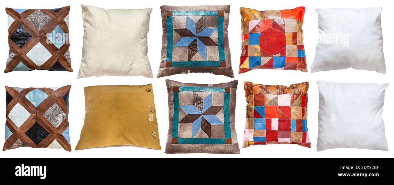 collection of various handmade pillows isolated on white background ...