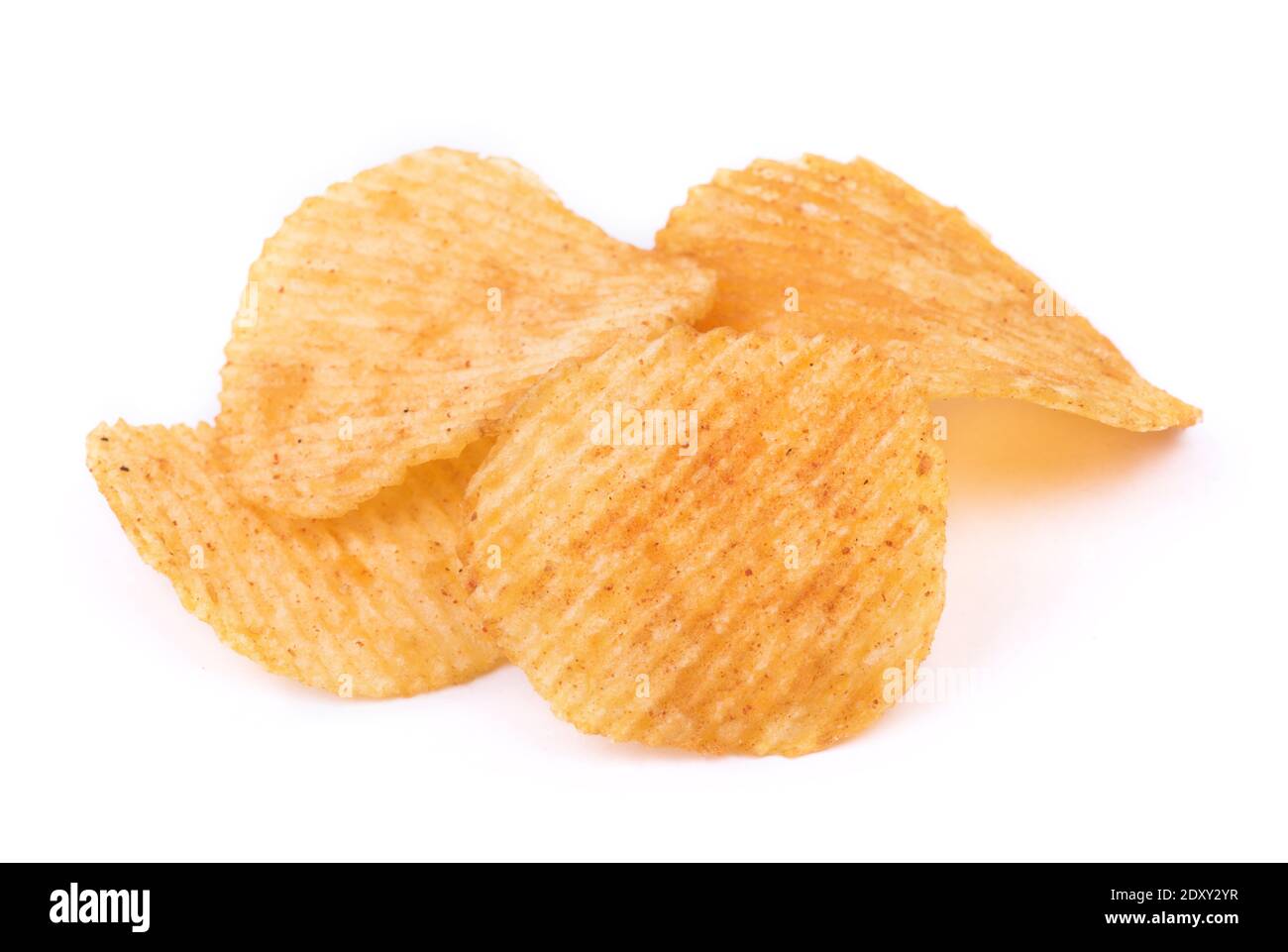 Pile of potato chips fluted isolated on a white background Stock Photo ...