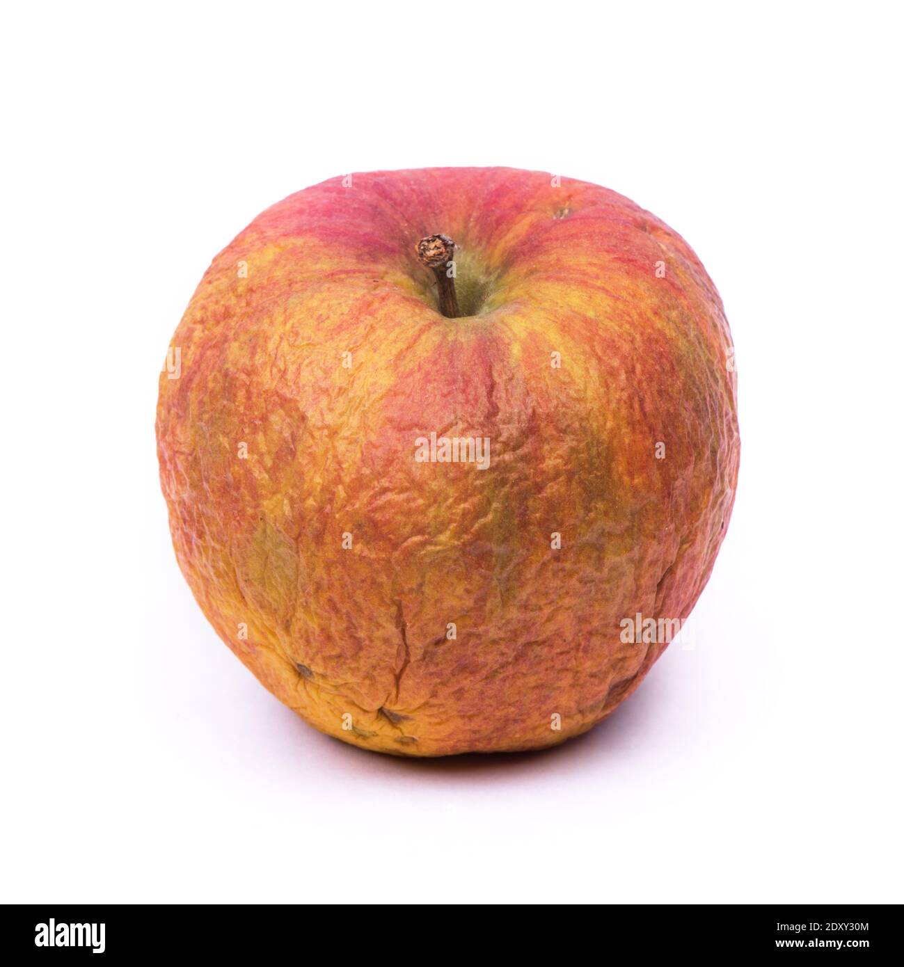 Old spoiled apple isolated on white background Stock Photo - Alamy
