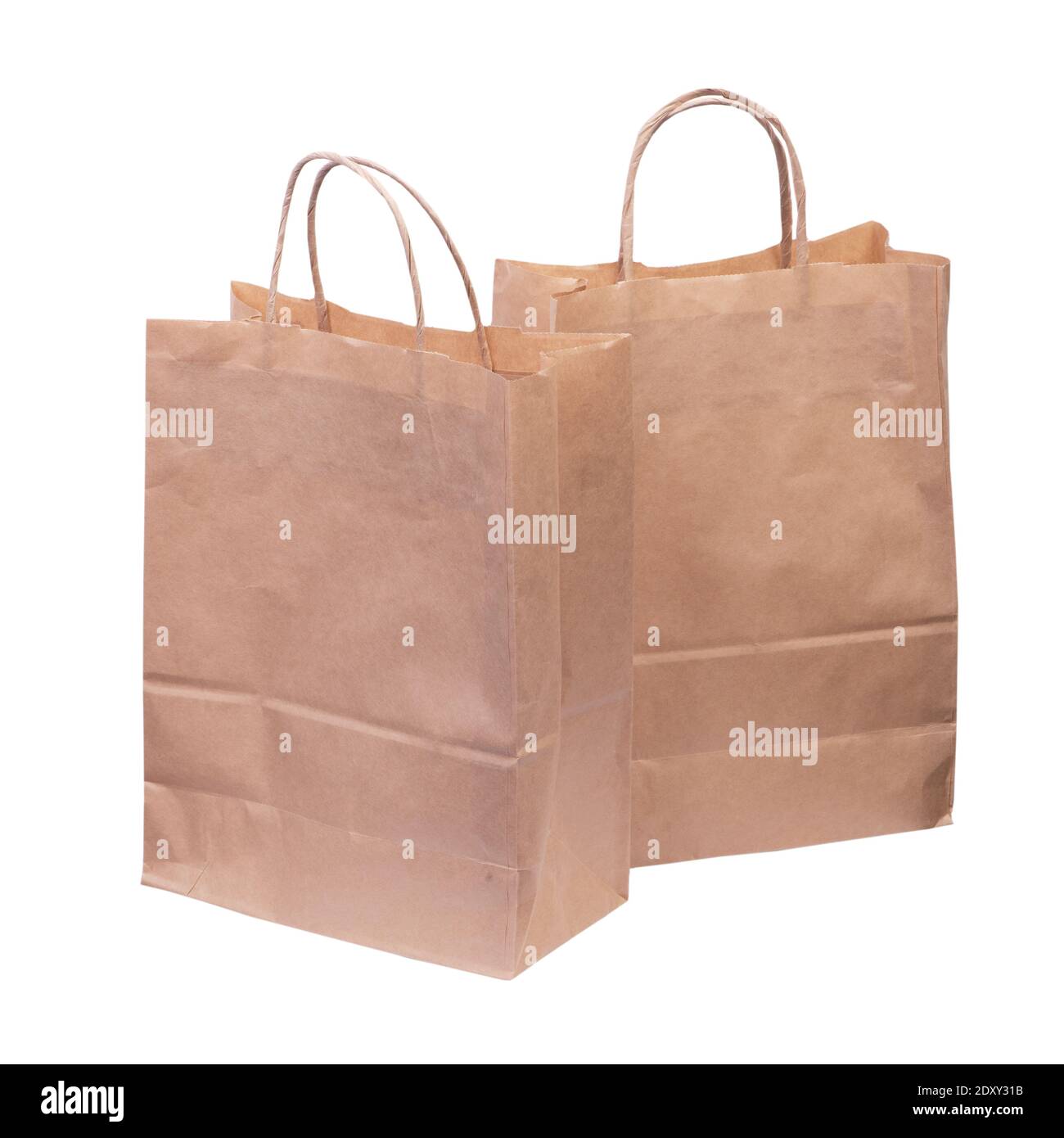 Two blank paper bags with handles isolated over white background Stock ...