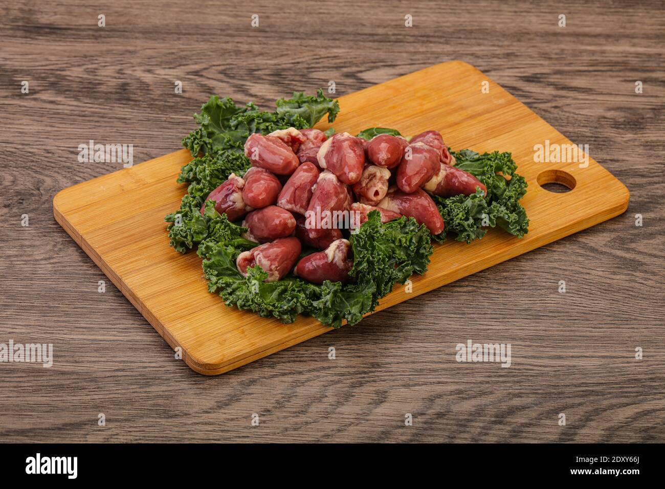 Raw chicken hearts heap for cooking Stock Photo - Alamy