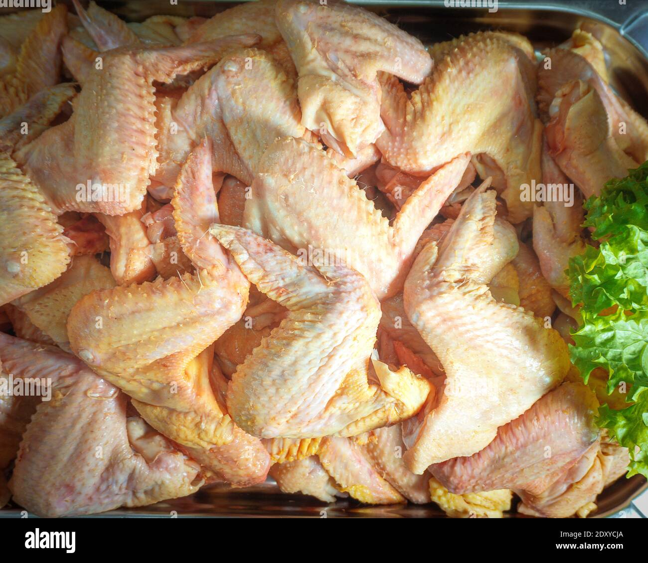 chicken wings meat on the counter at the bazaar Stock Photo - Alamy