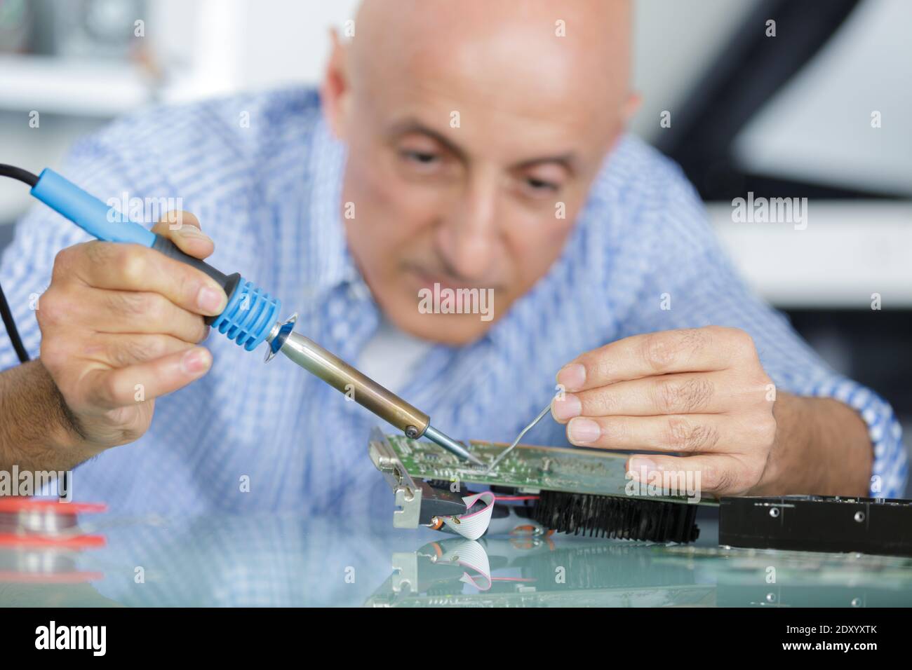 Technician repairing pc soldering hi-res stock photography and images ...