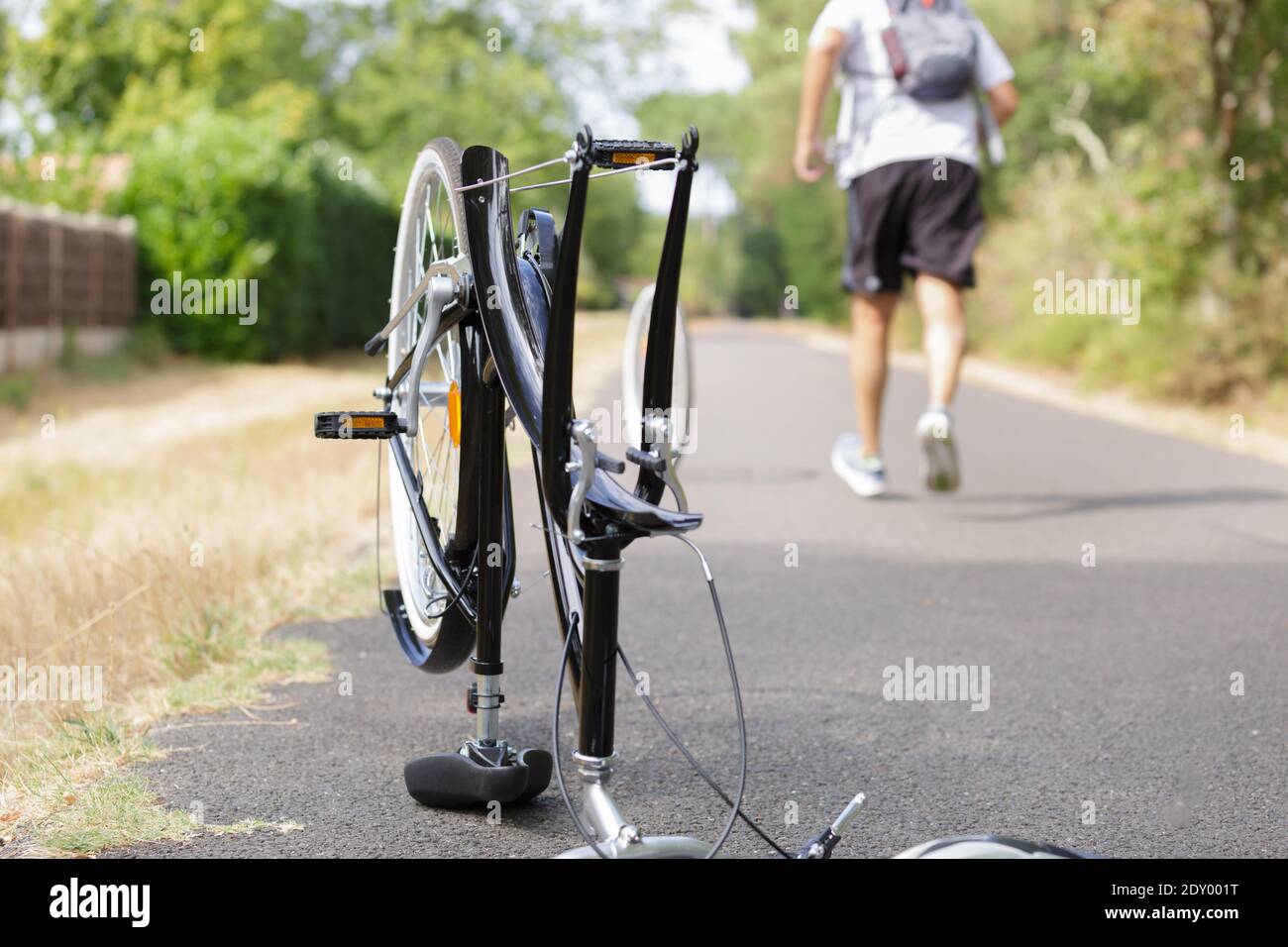 male with bike issues outdoors Stock Photo - Alamy