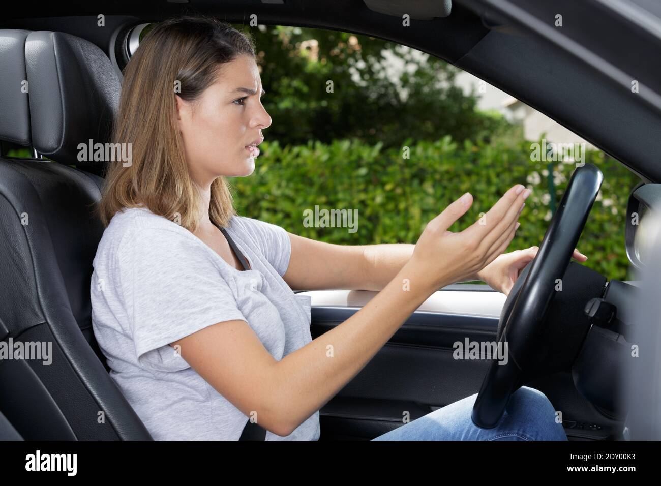 angry woman driving a car Stock Photo - Alamy