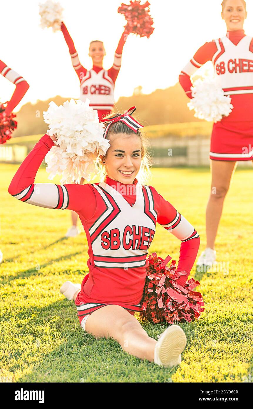 Red pom poms cheerleader hi-res stock photography and images - Alamy