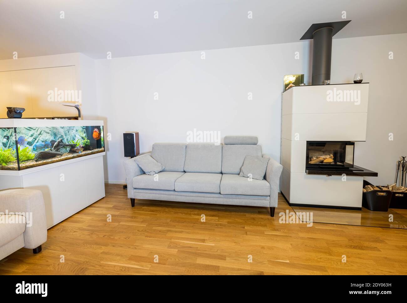 Beautiful view of interior of modern living room. White fireplace, big ...