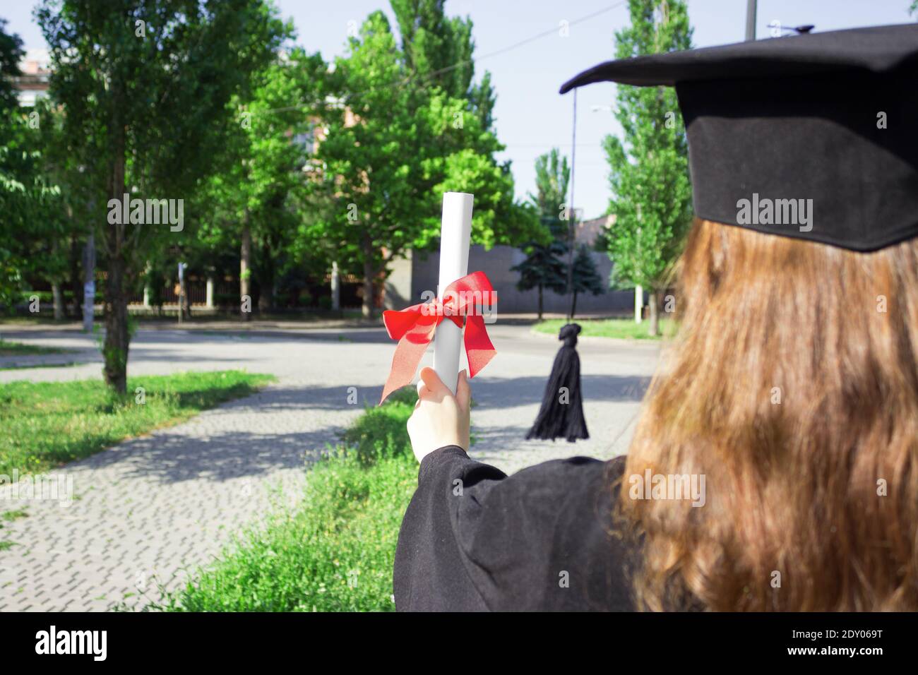 Woman graduation rear view hi-res stock photography and images - Alamy