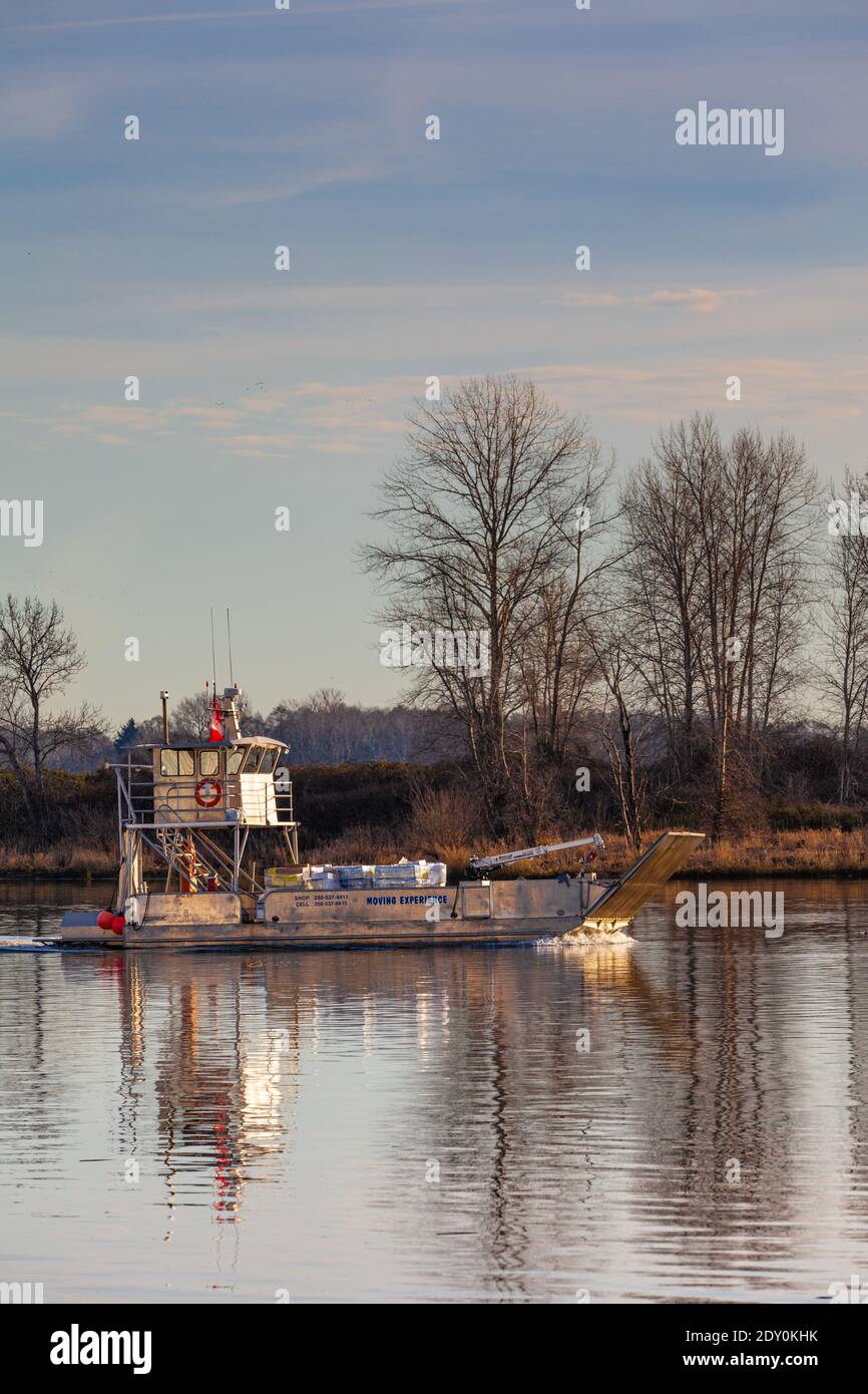 Shallow draught landing craft heading out to make a delivery in the ...
