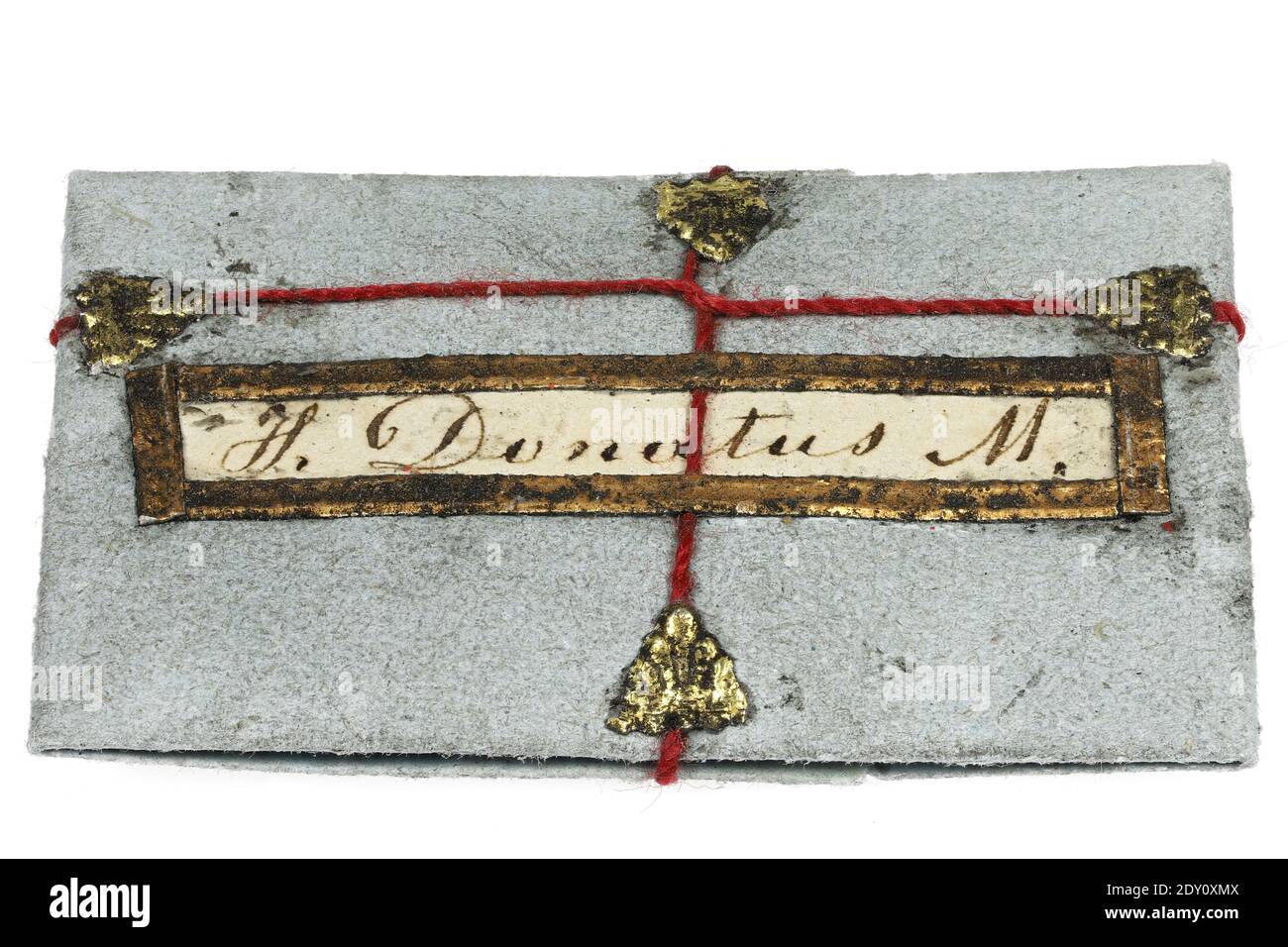 folded paper relic to Saint Donatus isolated on white background Stock ...