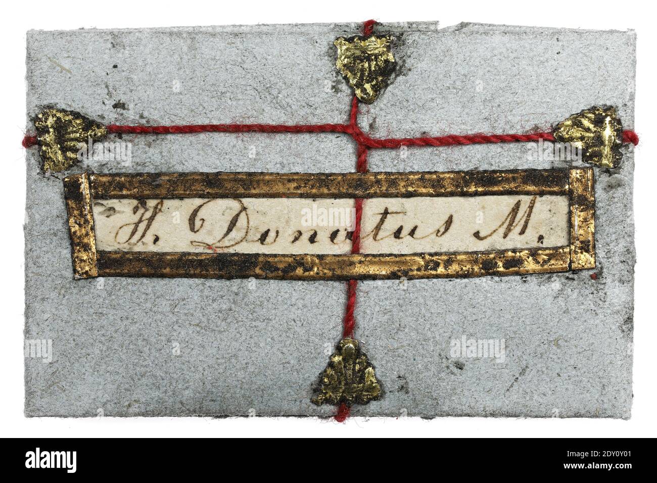 folded paper relic to Saint Donatus isolated on white background Stock ...