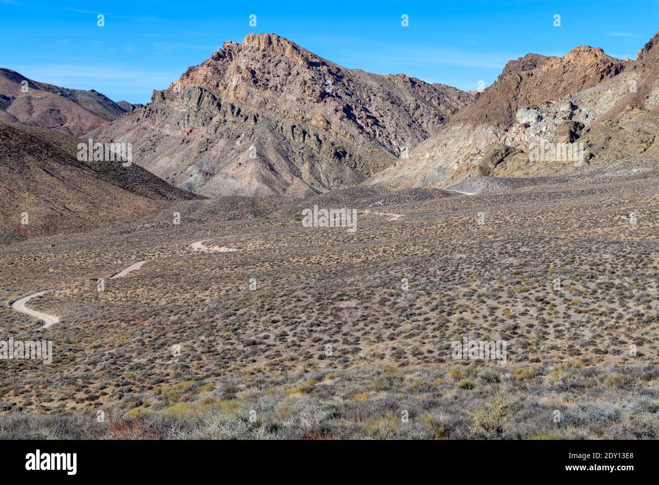 Titus Canyon Road winds through the desert in Death Valley National ...