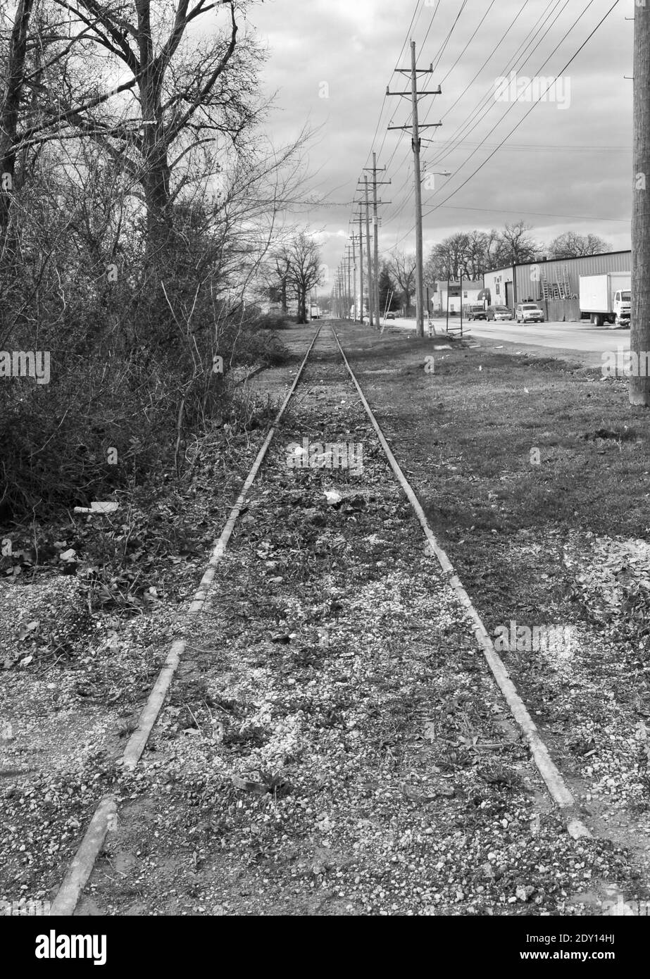 Seldom-used railroad industrial spur track Stock Photo - Alamy