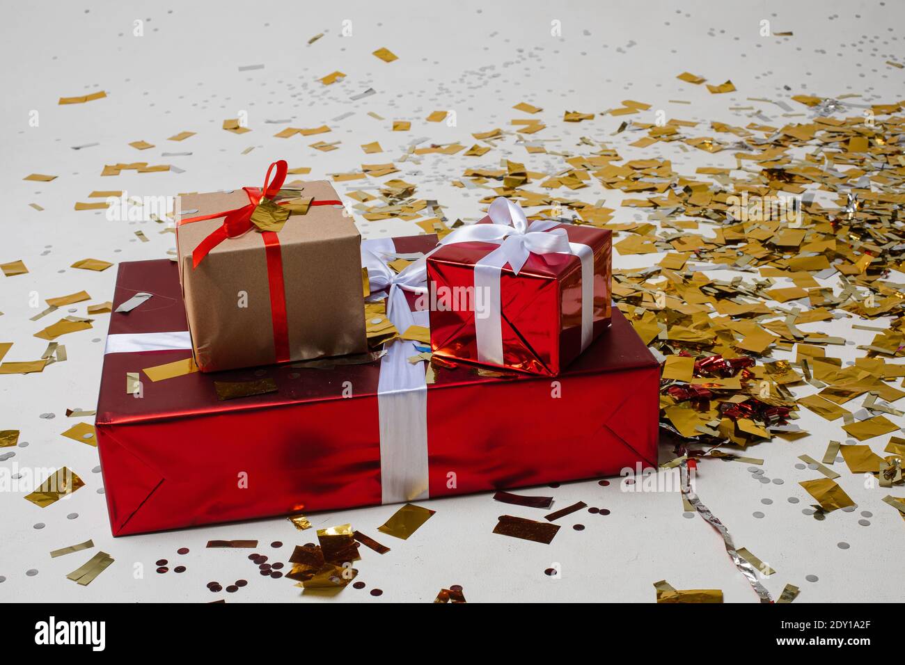 boxes with an interesting gifts in a beautiful pack isolated on white ...