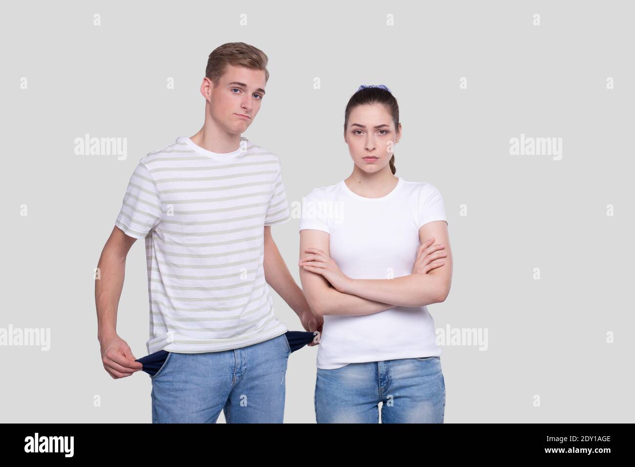 Man Showing Empty Pockets Girl is Disappointed. Family Budget. No Money ...