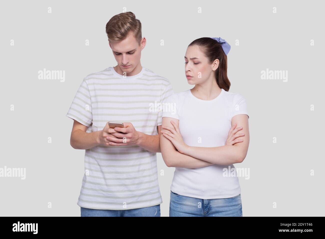 Man Chatting on Phone. Couple Using Phones Standing Isolated. Couple ...