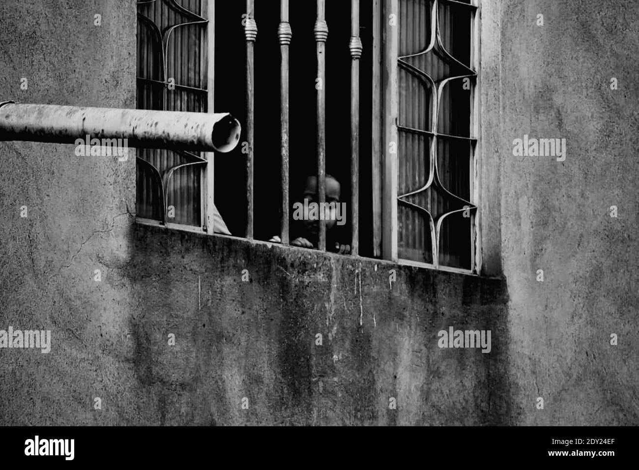 Person looking through window exterior Black and White Stock Photos ...