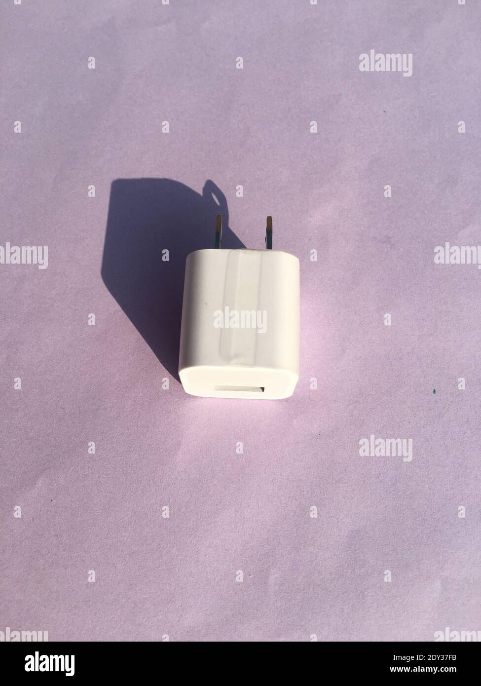 A top view of a charging unit on a white background Stock Photo - Alamy