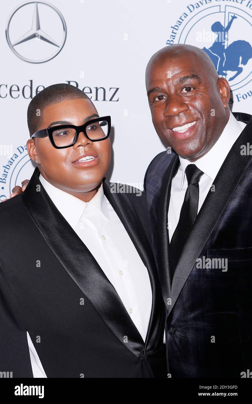 EJ Johnson and Earvin 'Magic' Johnson attend the 2014 Carousel Of Hope ...