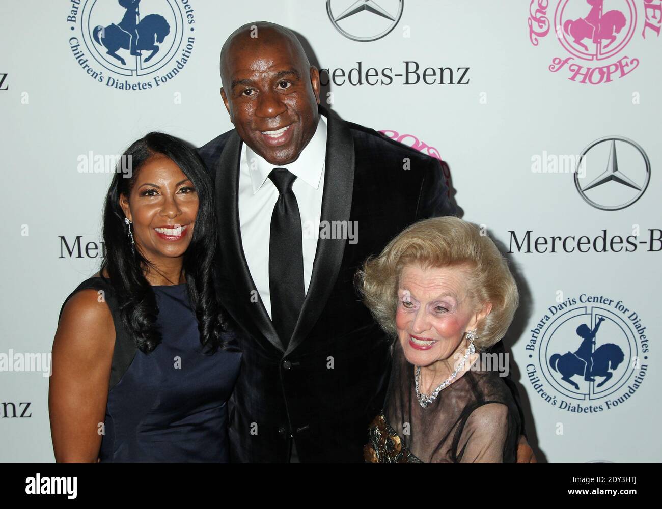 Earvin (Magic) Johnson, Cookie Johnson, Barbra Davis at the Carousel Of ...
