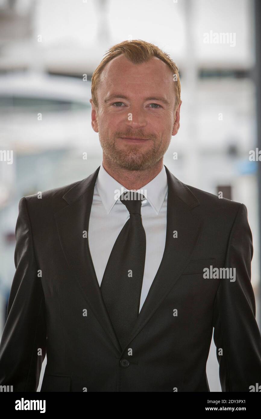 Richard Dormer of "Games of Thrones" posing at the photocall for MIPCOM ...